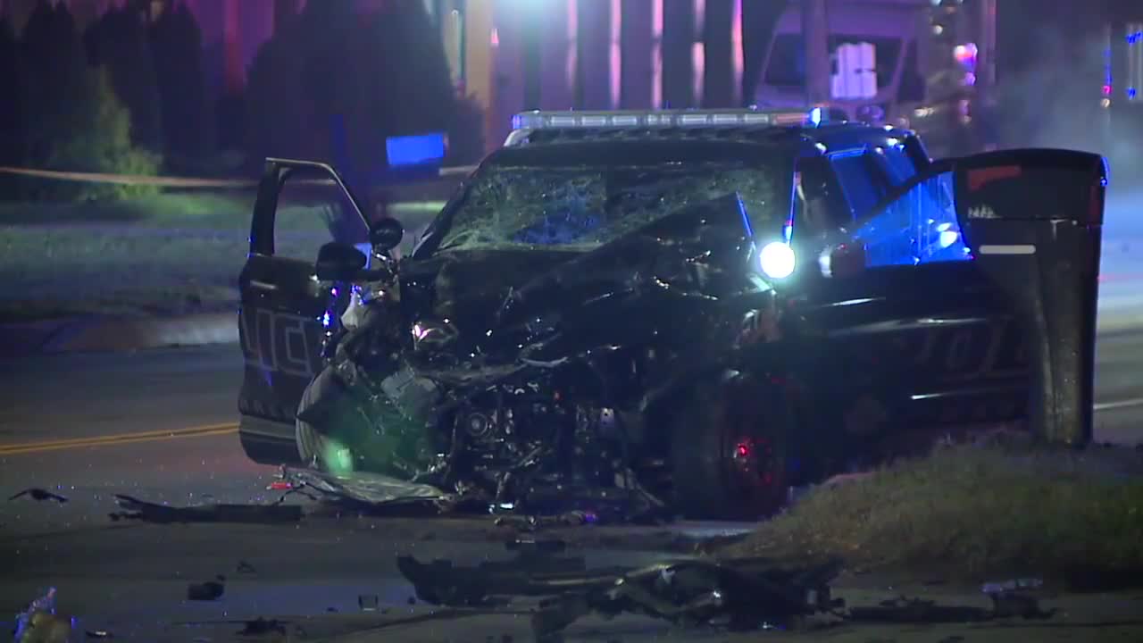 Two dead, two officers hospitalized in early morning Warren crash
