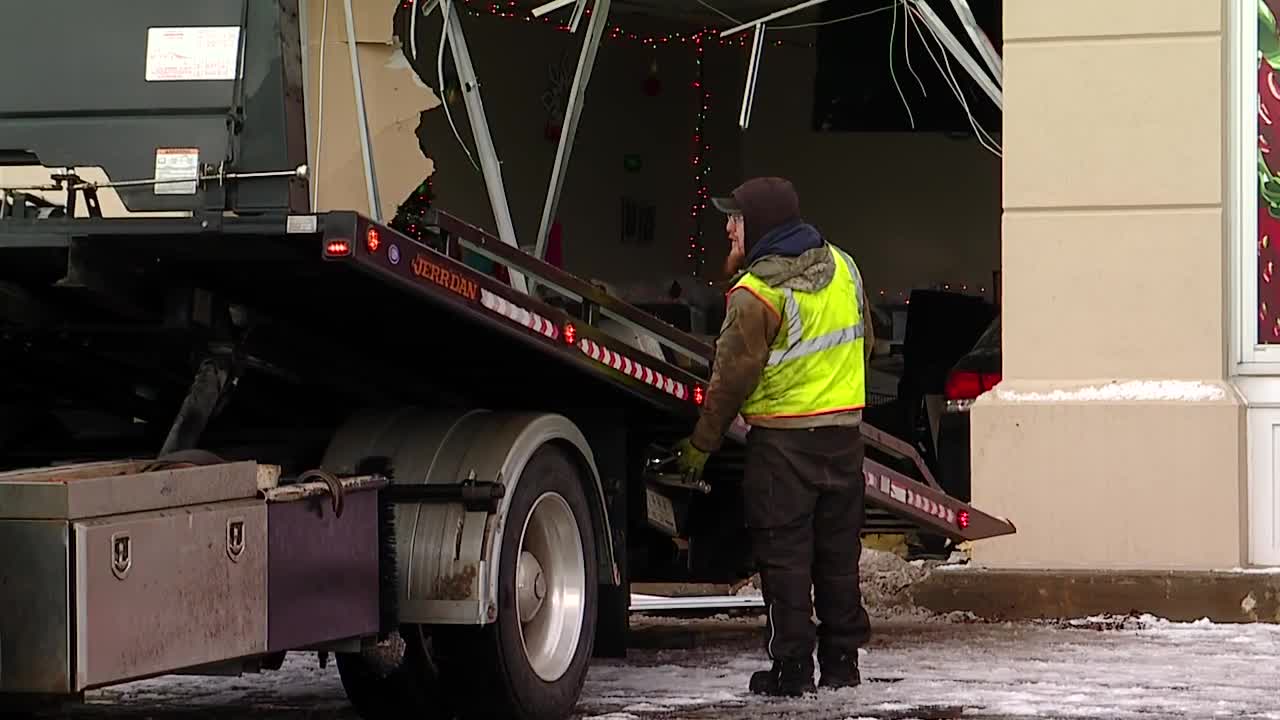 Car smashes into Cascade Meijer, injuring 4 people