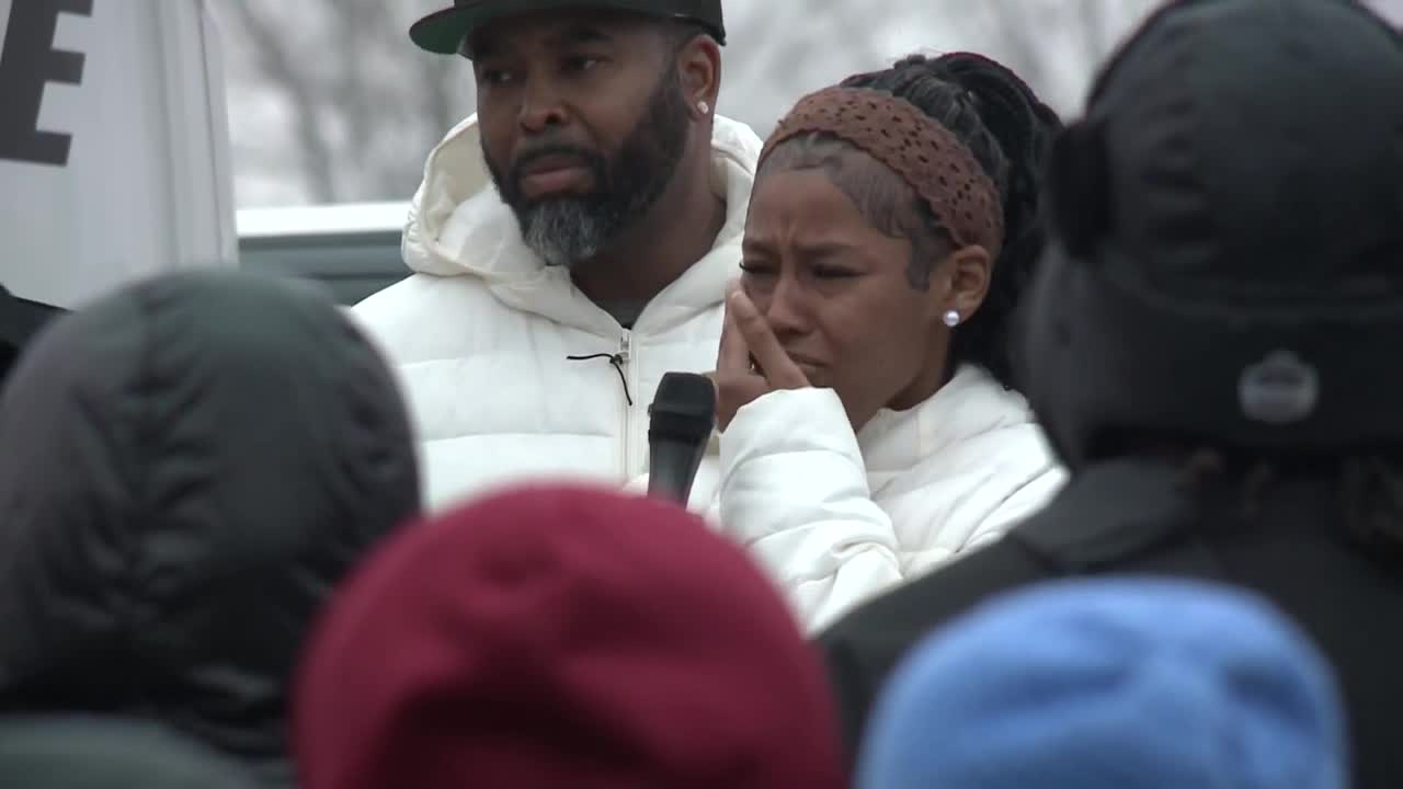 Rally held in support of runner charged with assault in viral baton ...