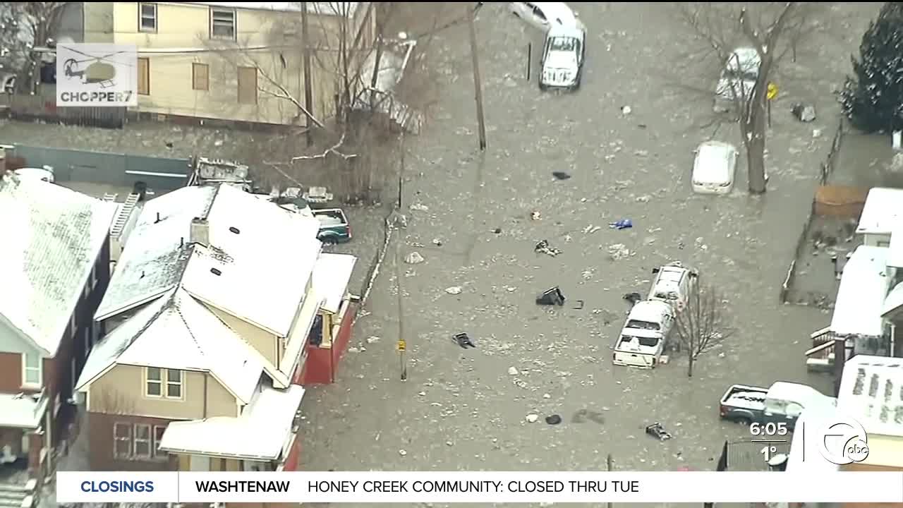 Repair work continues overnight water main break causes flooding in SW ...