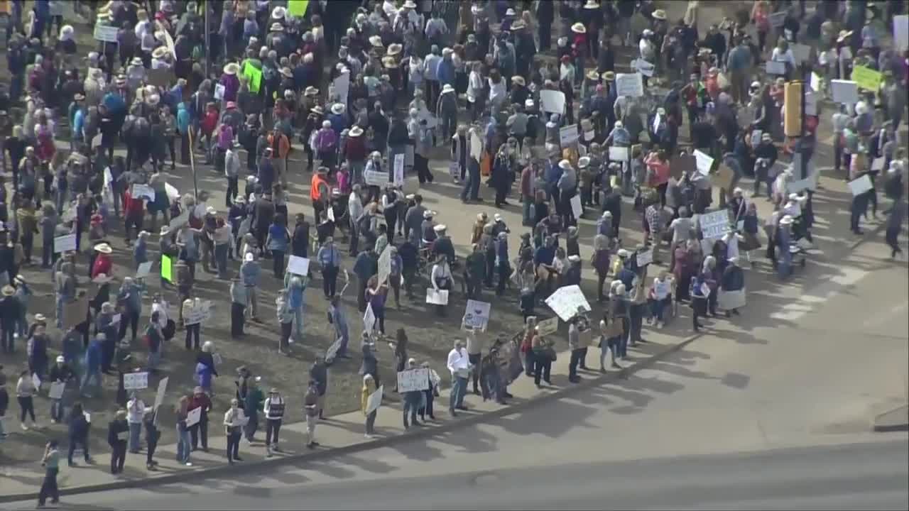 Hundreds gather near Boulder NOAA campus in protest of cuts to the agency